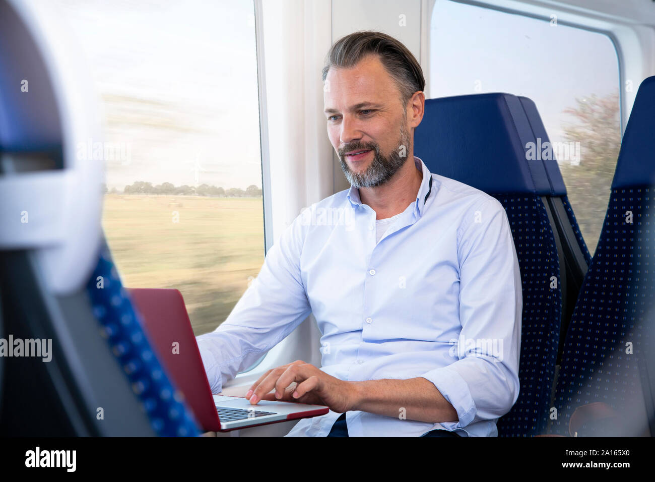 Laptop man transport hi-res stock photography and images - Alamy