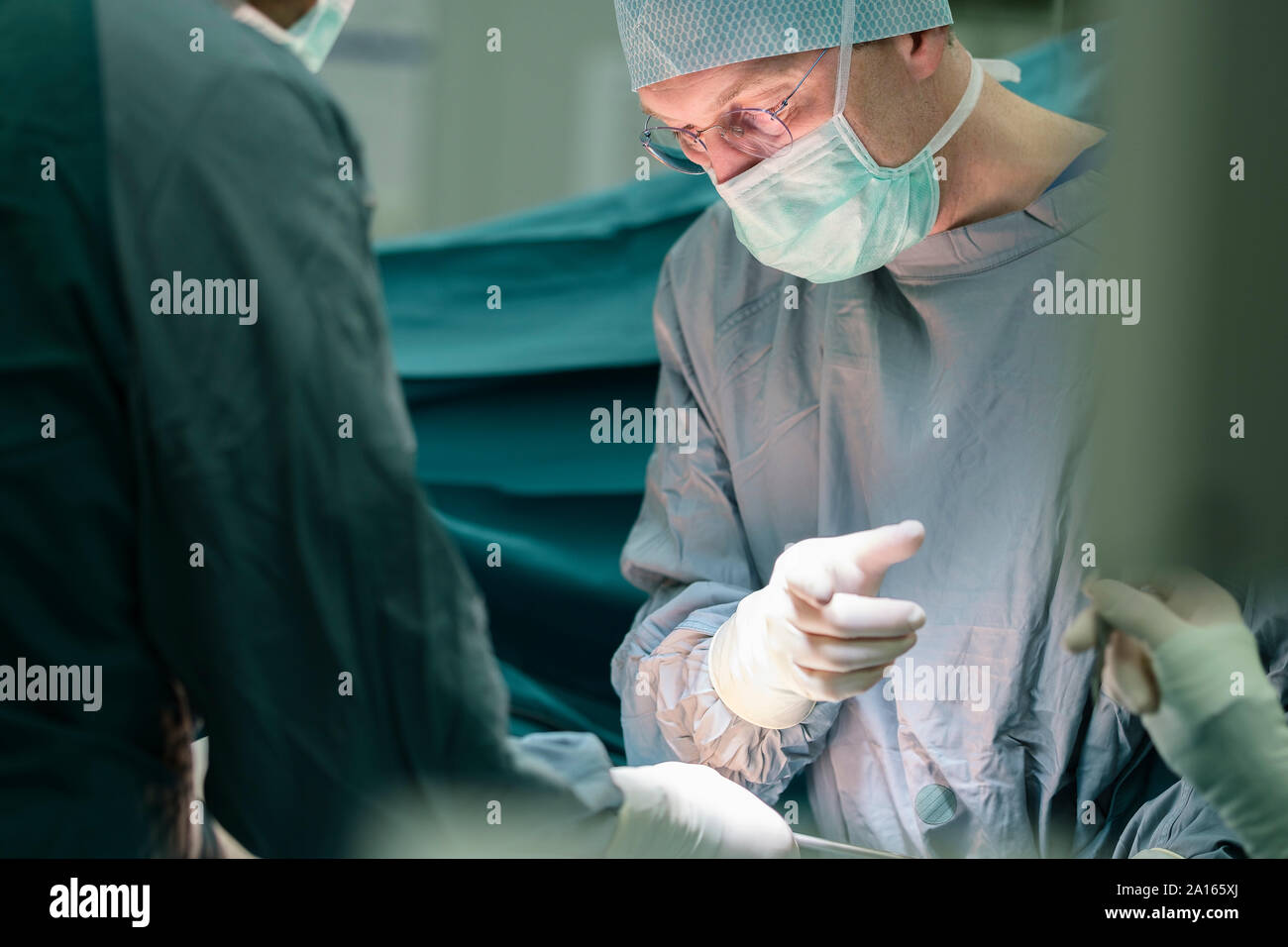 Surgeon during surgery Stock Photo - Alamy