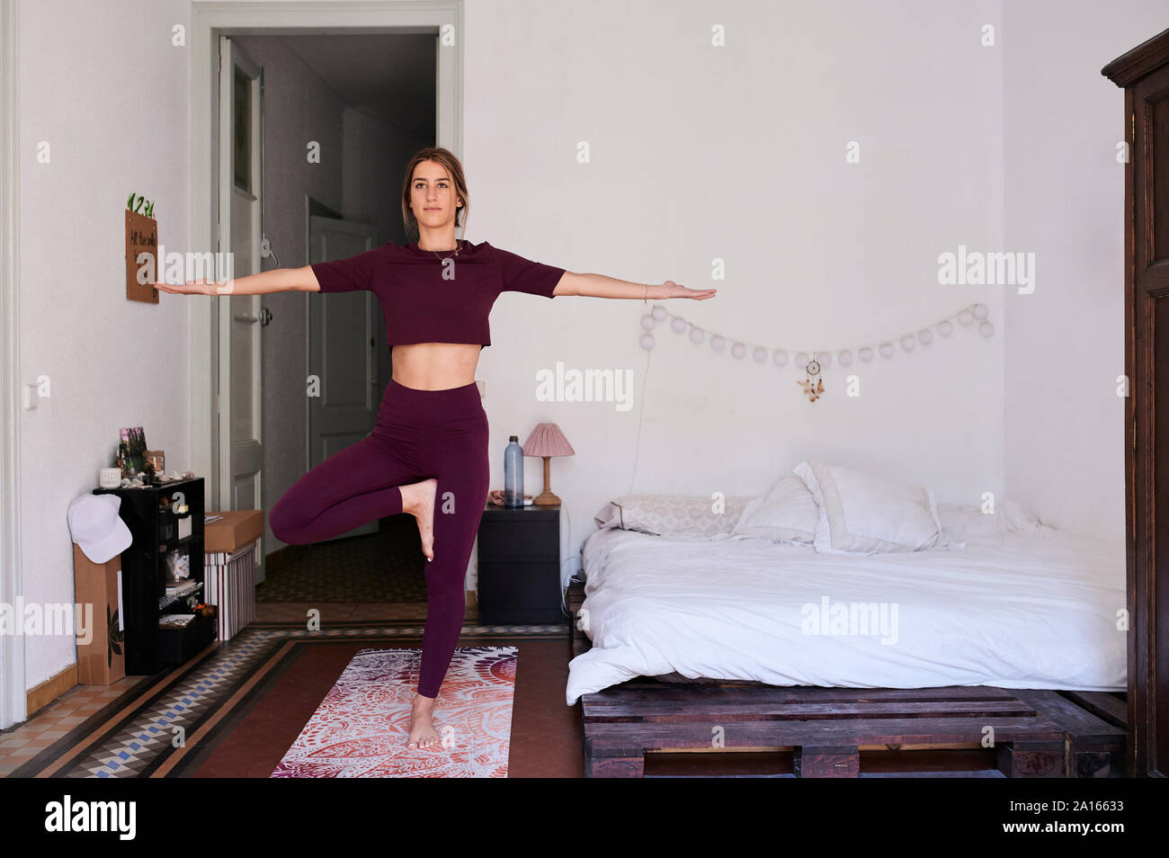 Smiling young women practising hi-res stock photography and images - Alamy