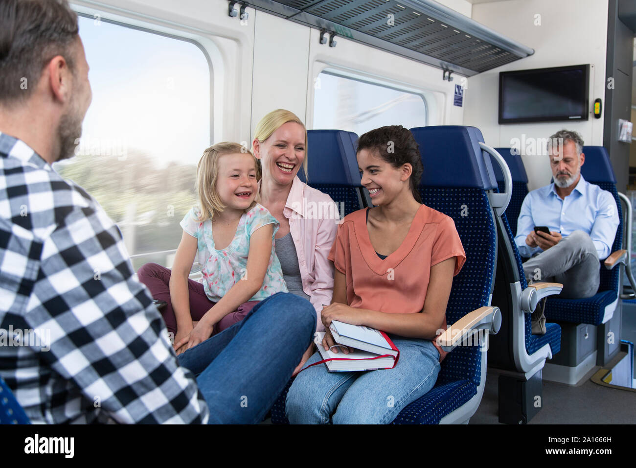 Two men sitting in train hi-res stock photography and images - Alamy