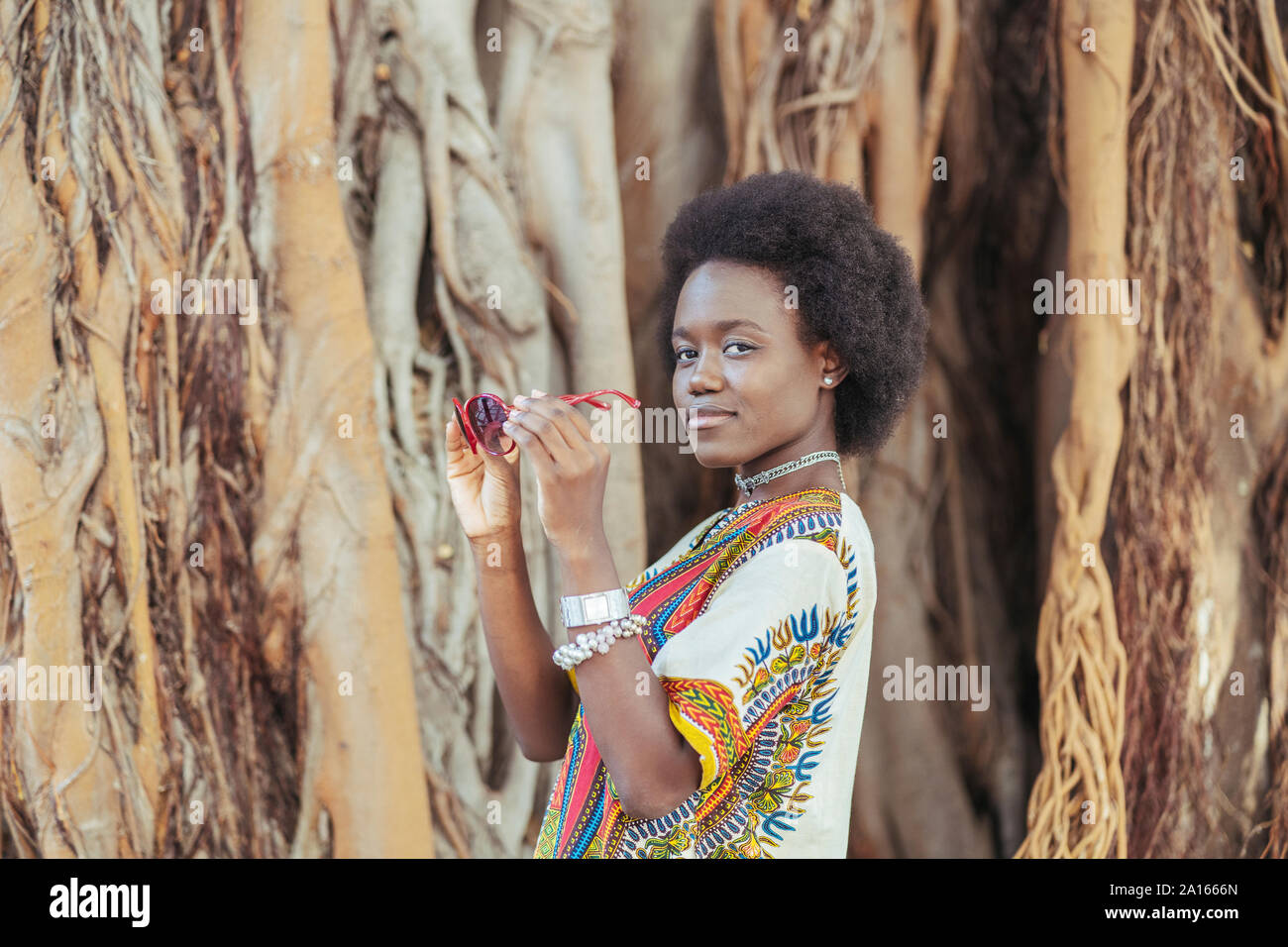 Woman up in a tree hi-res stock photography and images - Alamy