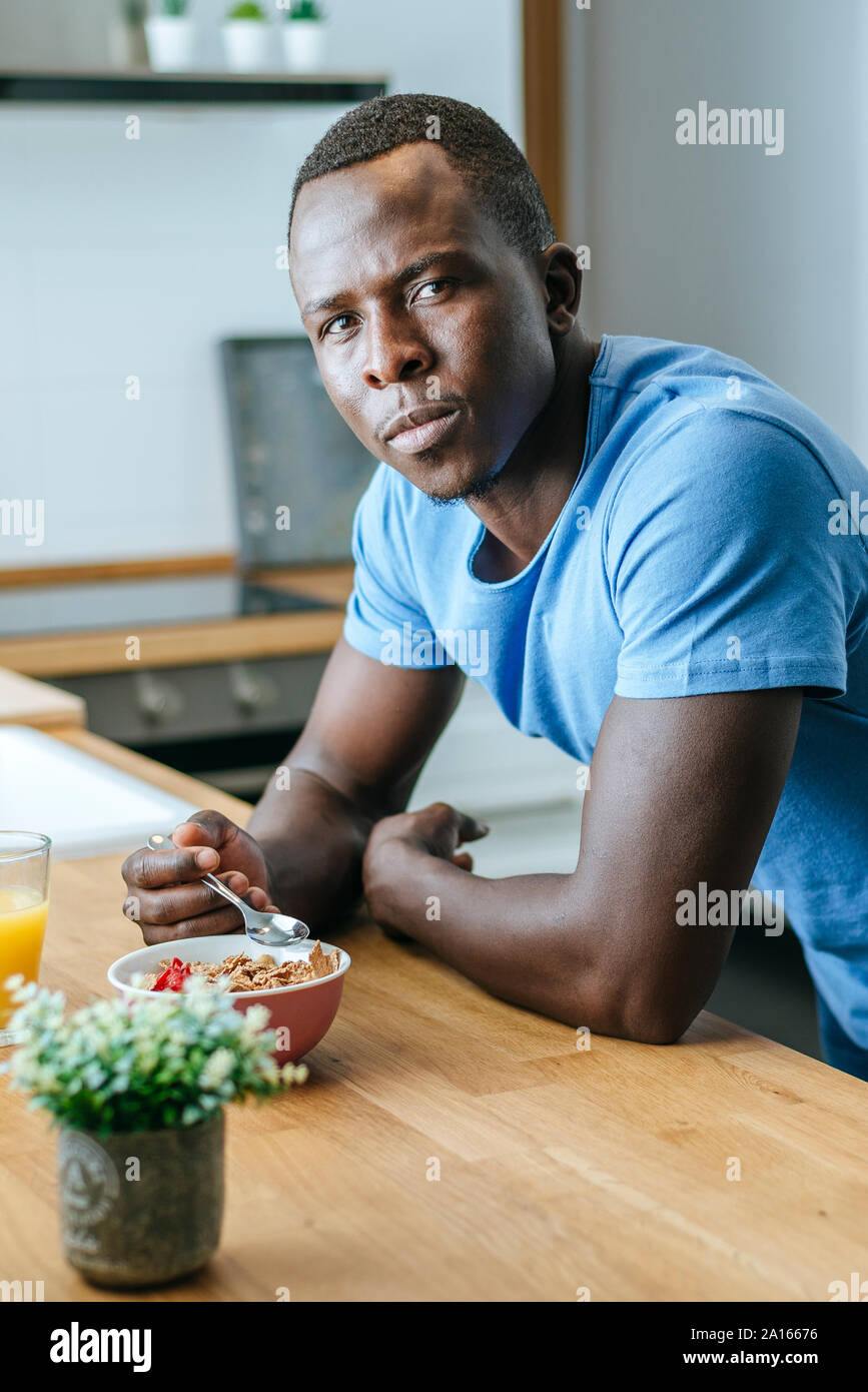 African man eating breakfast hi-res stock photography and images - Alamy