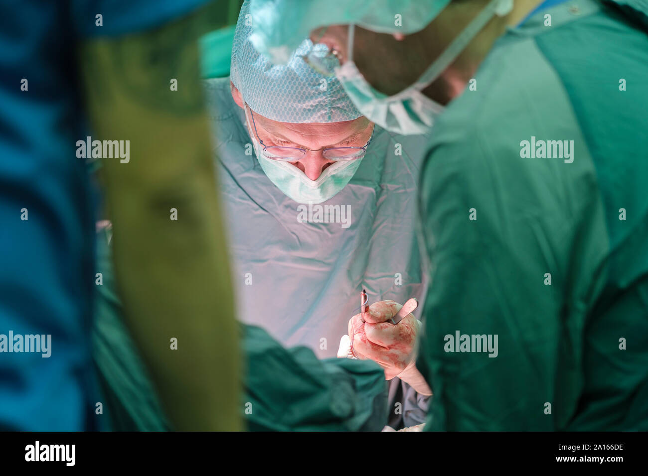 Surgeon during surgery Stock Photo - Alamy