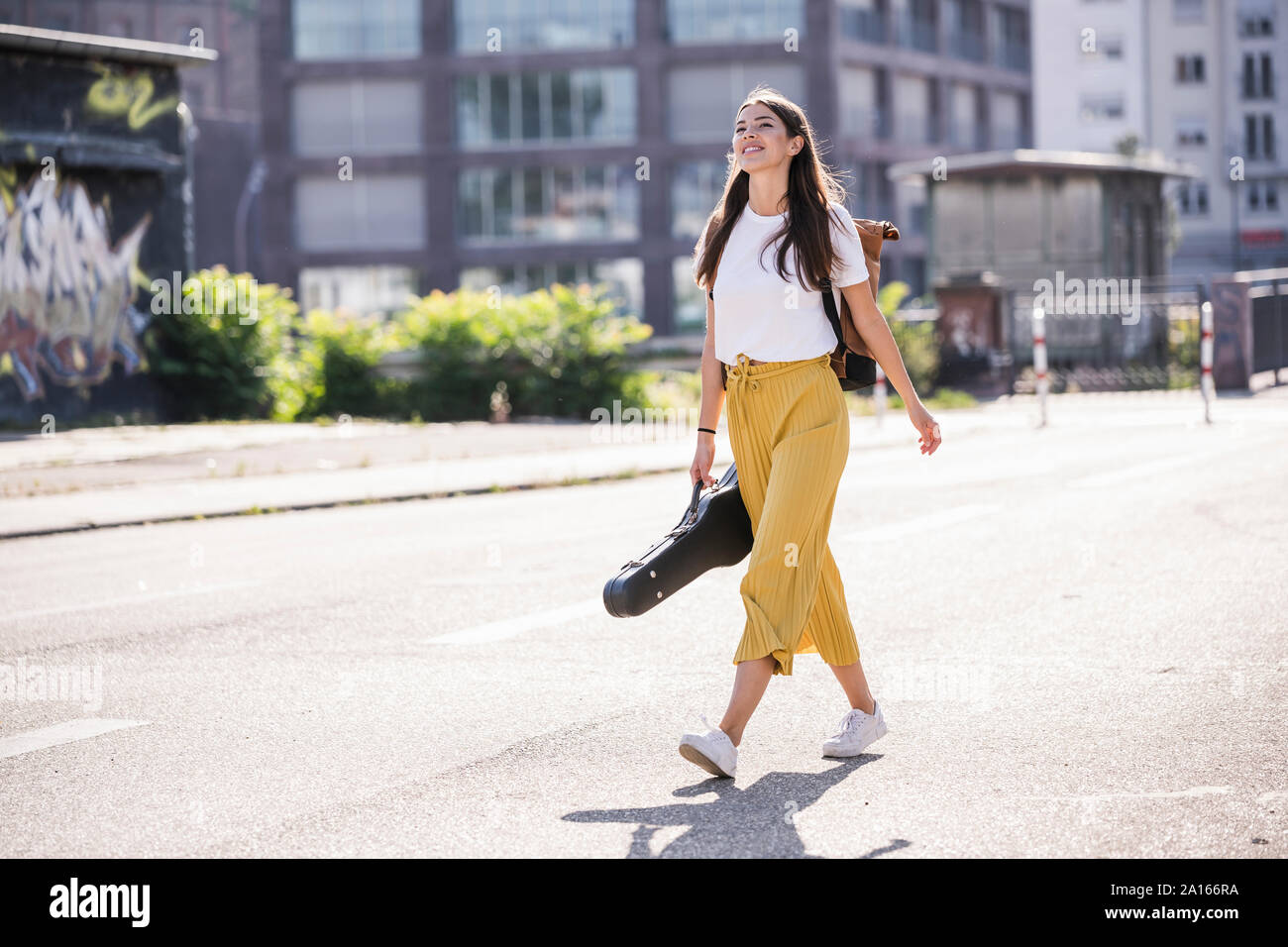 Carrying instrument hi-res stock photography and images - Alamy