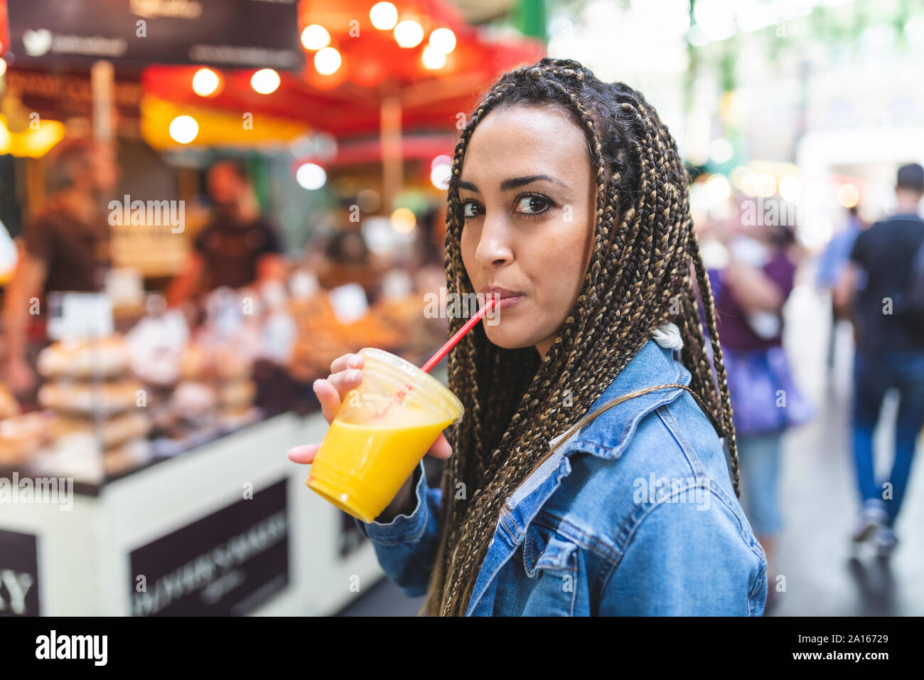 Woman drinking on street london hi-res stock photography and images - Alamy