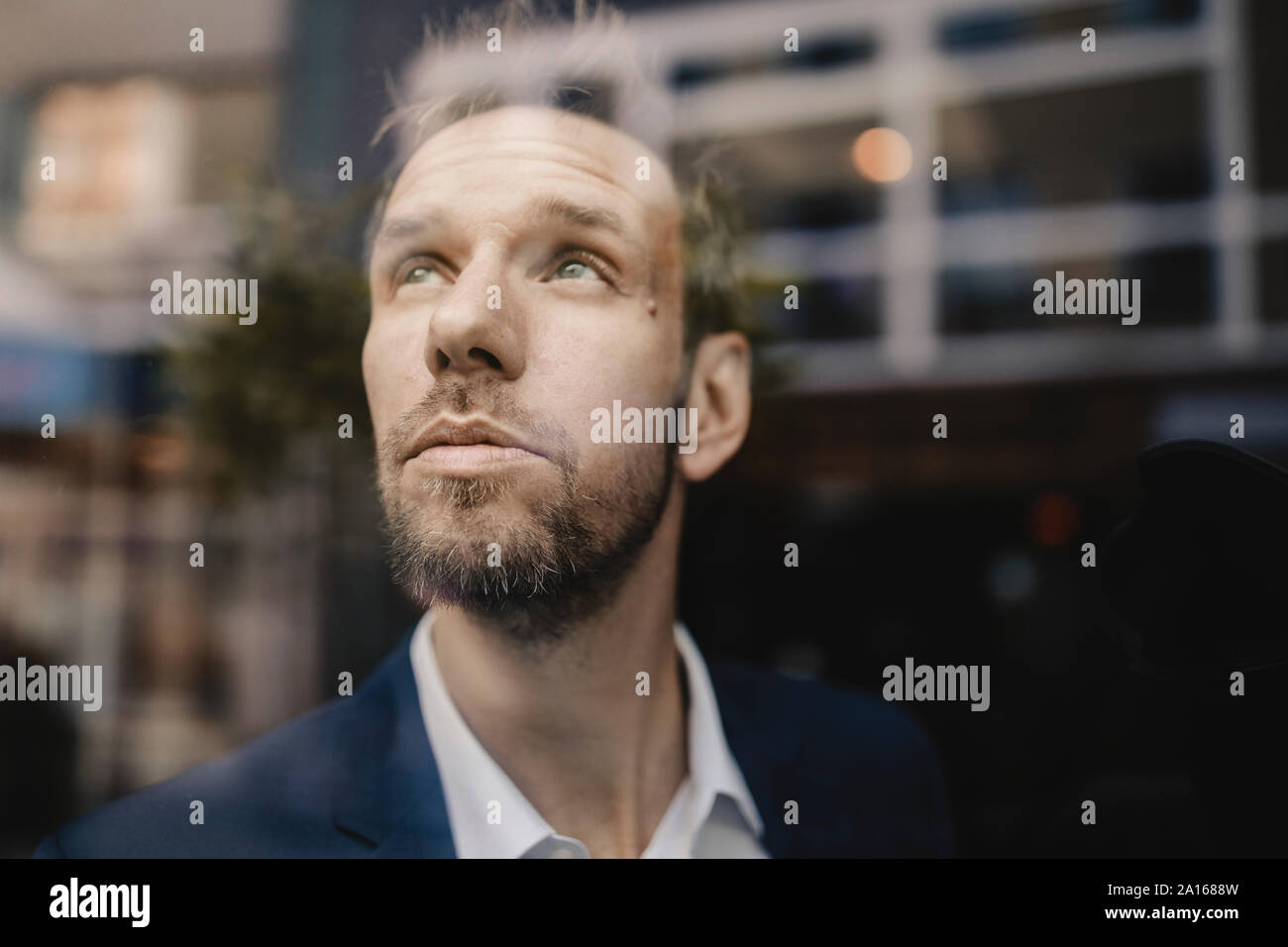 Man waiting looking out window hi-res stock photography and images - Alamy