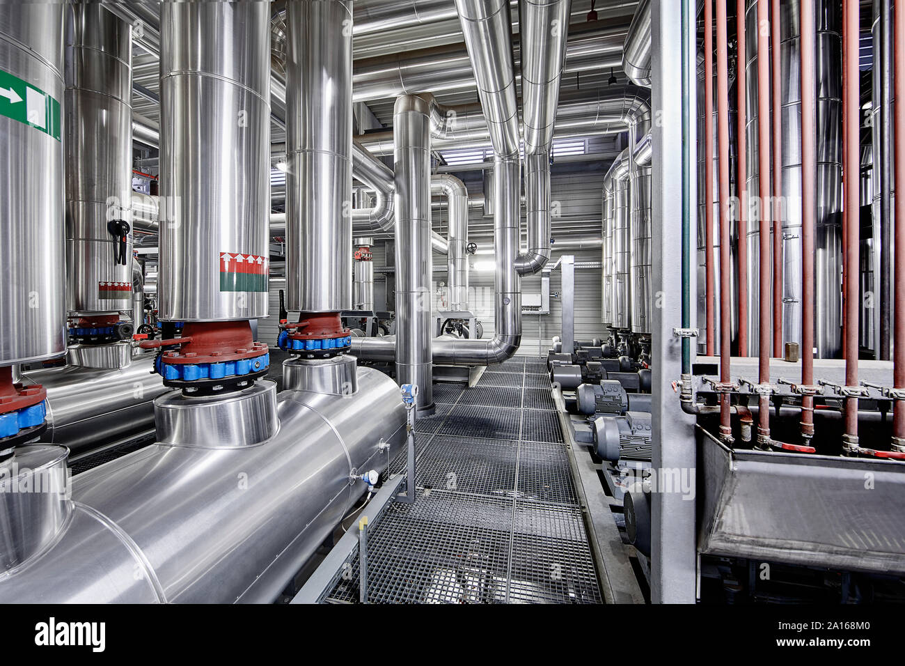 Pipeworks with insulation in a technical room Stock Photo - Alamy