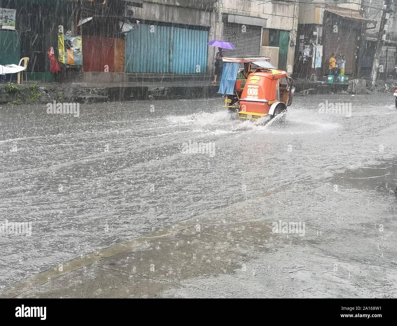 Flooding in Arayaat St. in Cubao, Quezon City as heavy monsoon brought ...