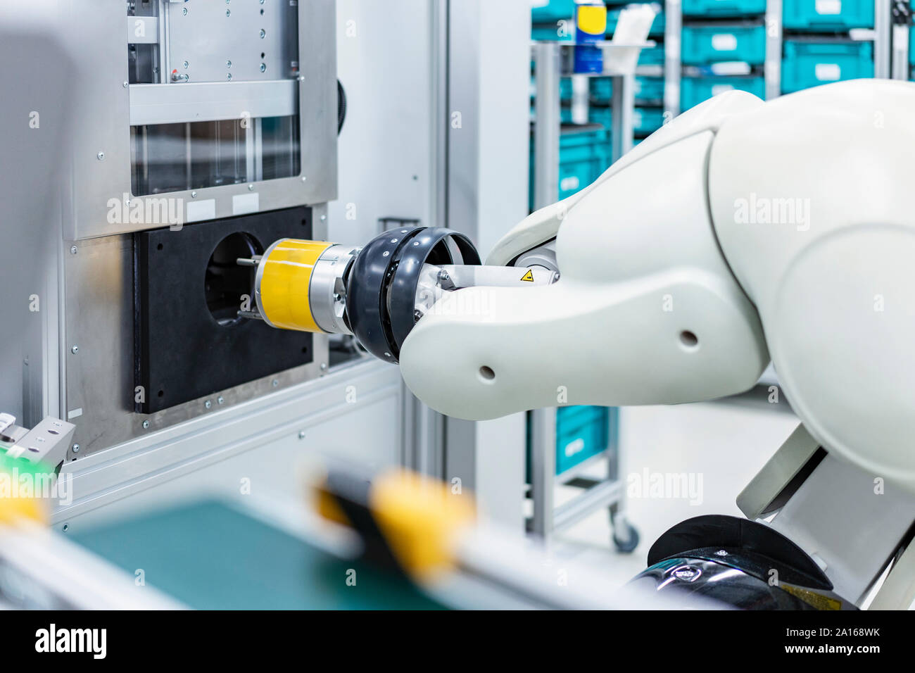 Arm of assembly robot functioning inside modern factory, Stuttgart ...