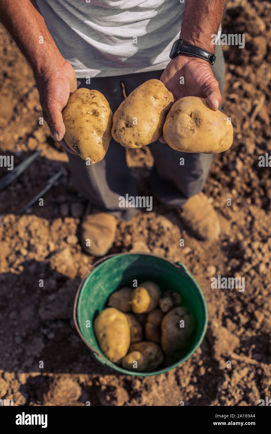 Man holding pitchfork hi-res stock photography and images - Alamy