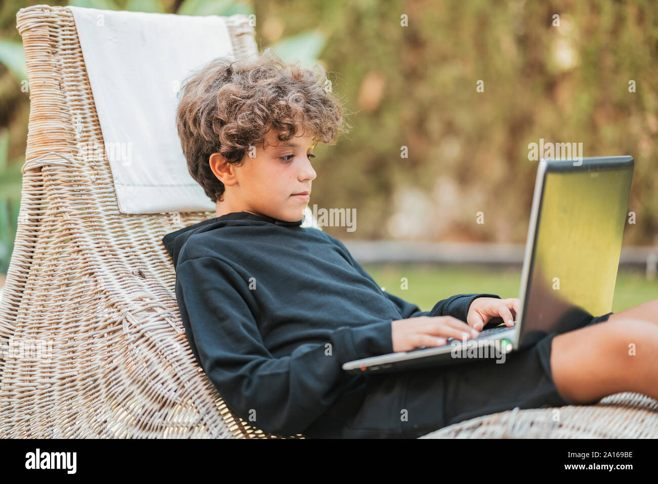 Boy relaxed hi-res stock photography and images - Alamy