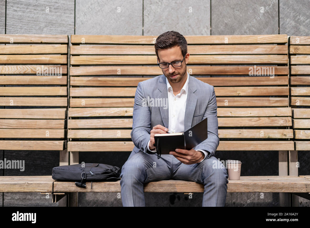 Three adults people writing hi-res stock photography and images - Alamy