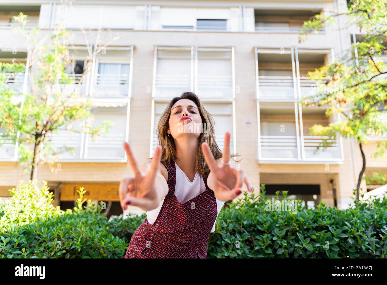 Hand making a peace sign hi-res stock photography and images - Alamy