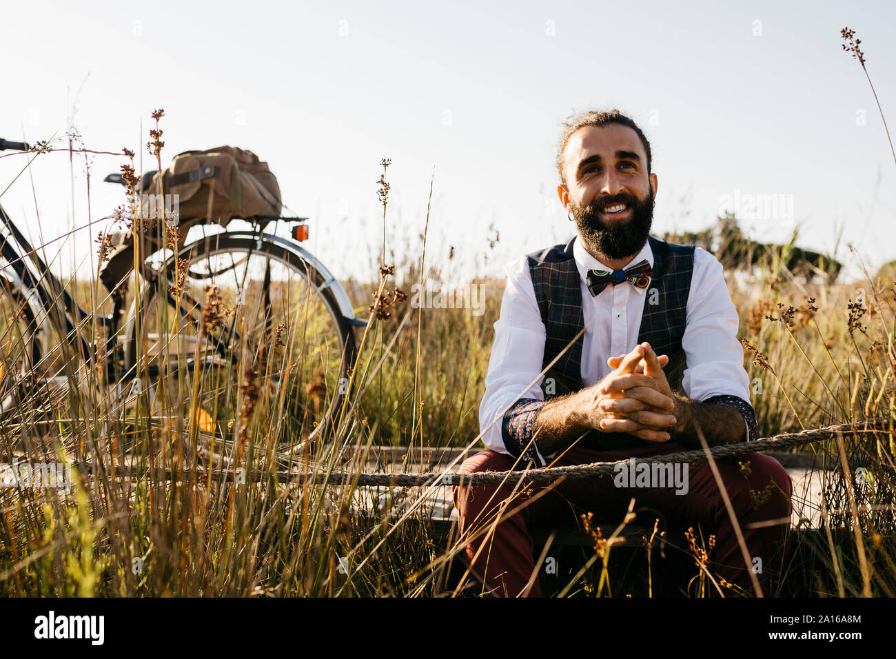 Enjoying view man sitting countryside hi-res stock photography and ...