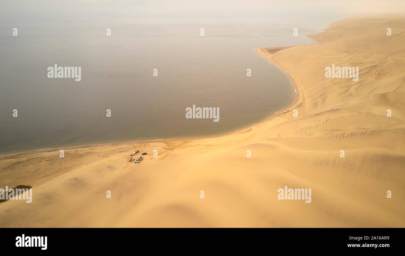 Aerial view of expedition of 4x4 cars, from Tombua to Foz de Cunene ...