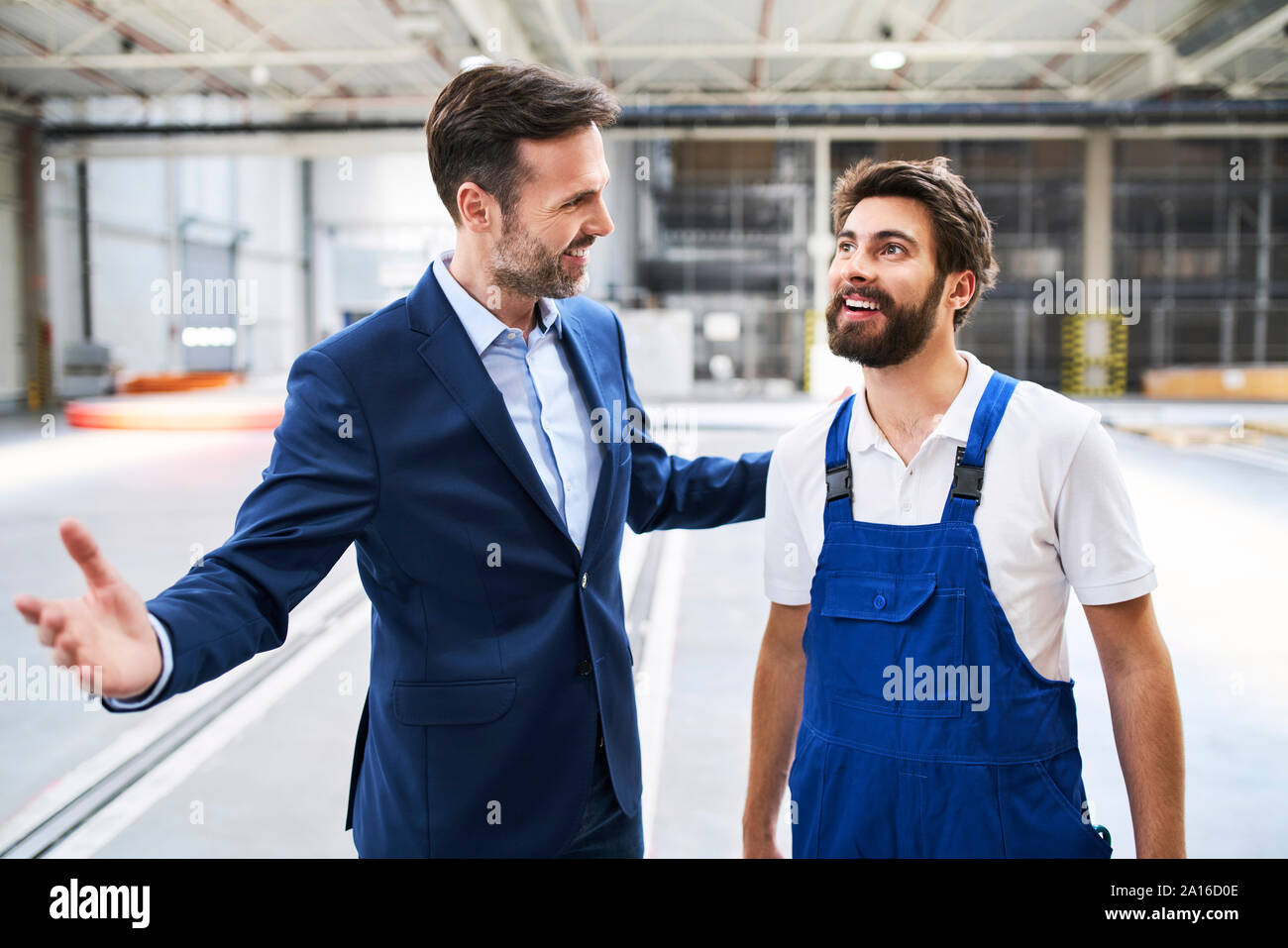 Cheerful and employee and factory hi-res stock photography and images ...