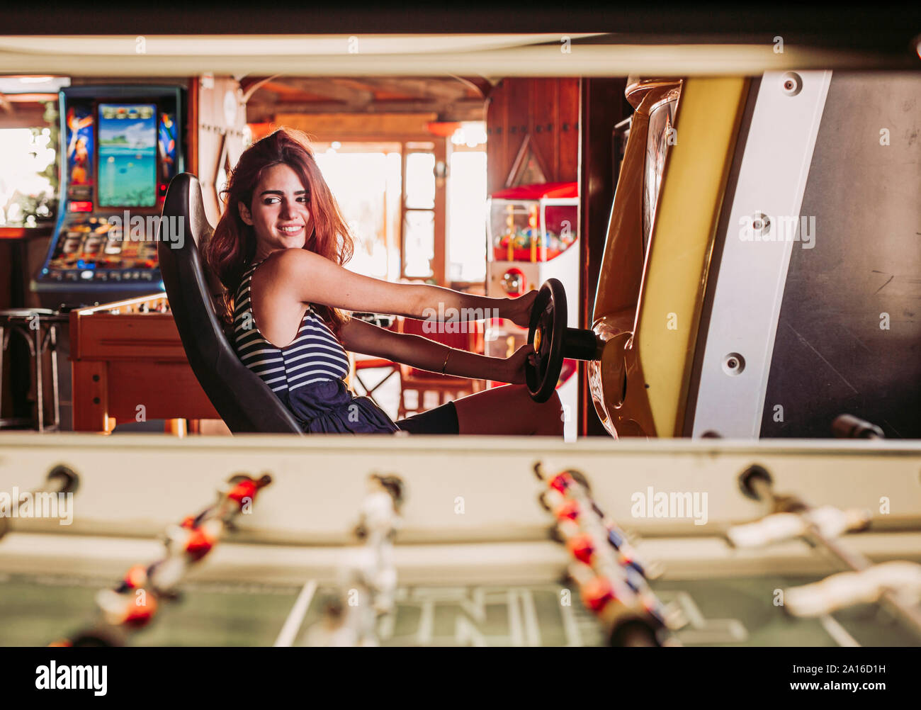 Smiling woman enjoying game table hi-res stock photography and images ...
