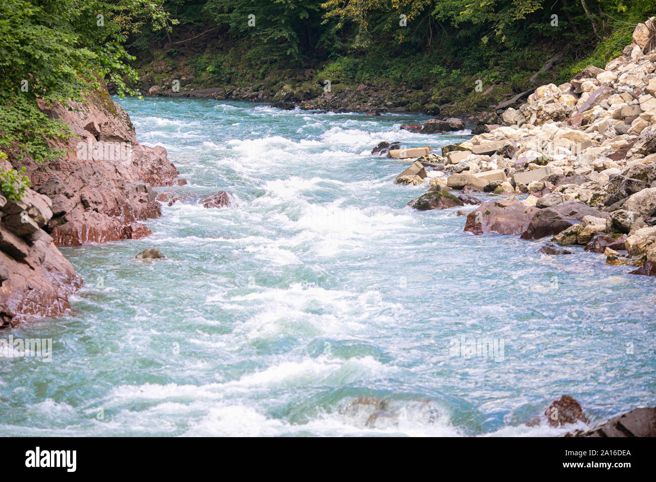 Glacier river flowing between rocks hi-res stock photography and images ...