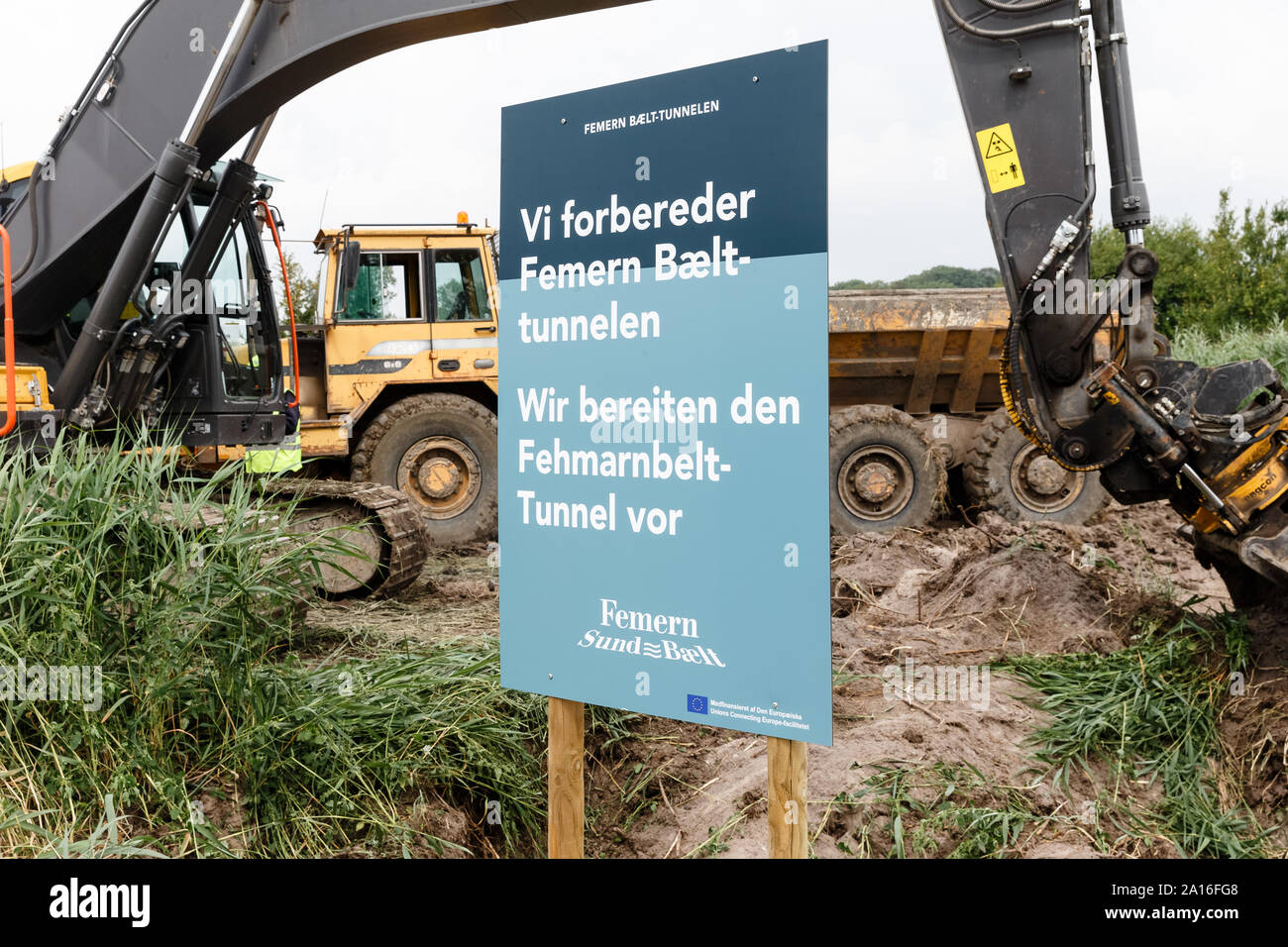 Denmark. 01st Aug, 2019. Construction machines dig a drainage ditch on ...