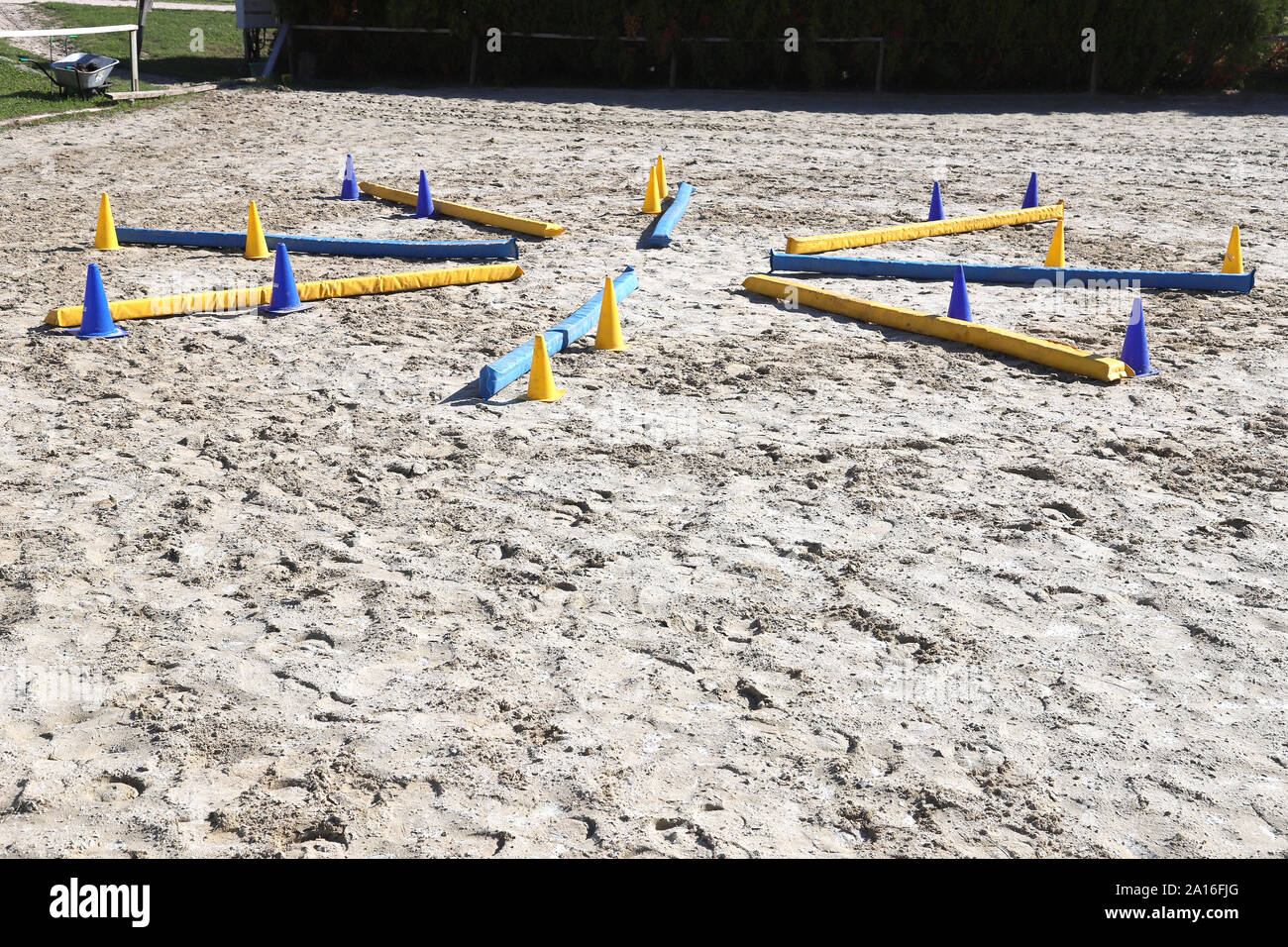 Obstacles for horses in a riding school.Various colorful obstacles for ...