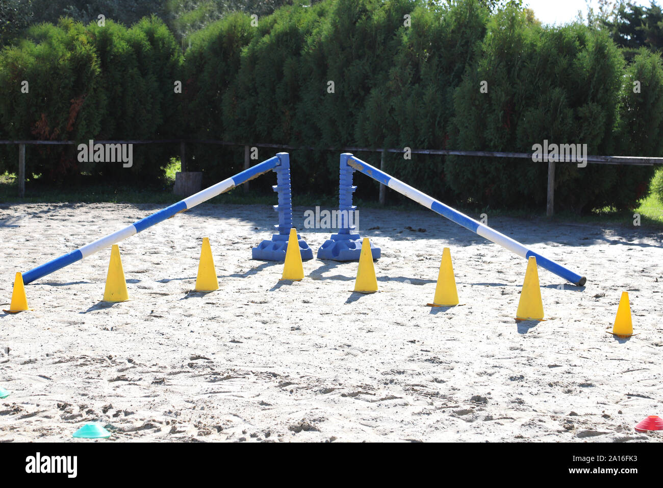 Obstacles for horses in a riding school.Various colorful obstacles for ...
