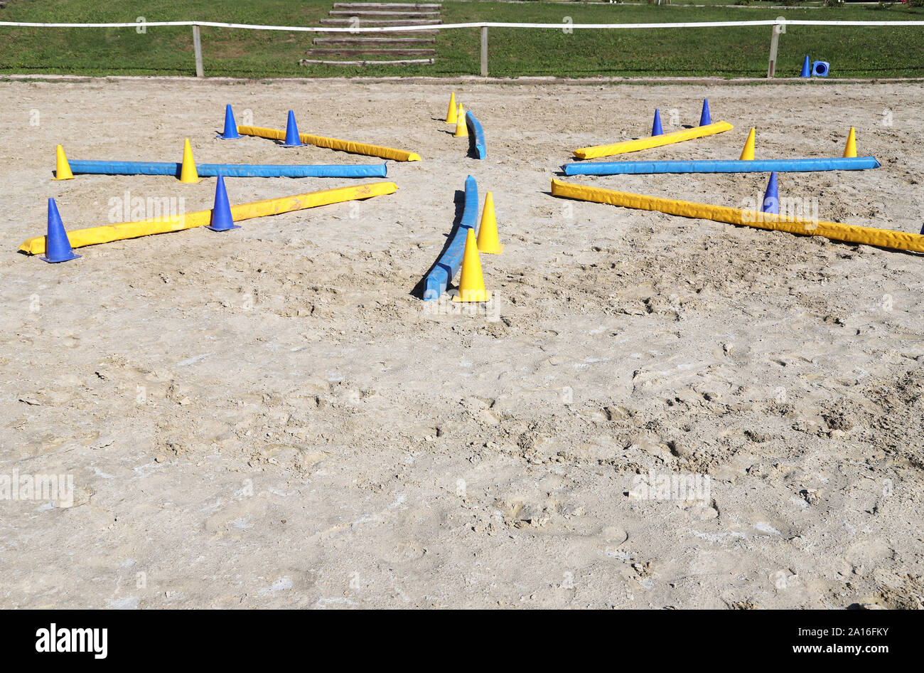 Obstacles for horses in a riding school.Various colorful obstacles for ...