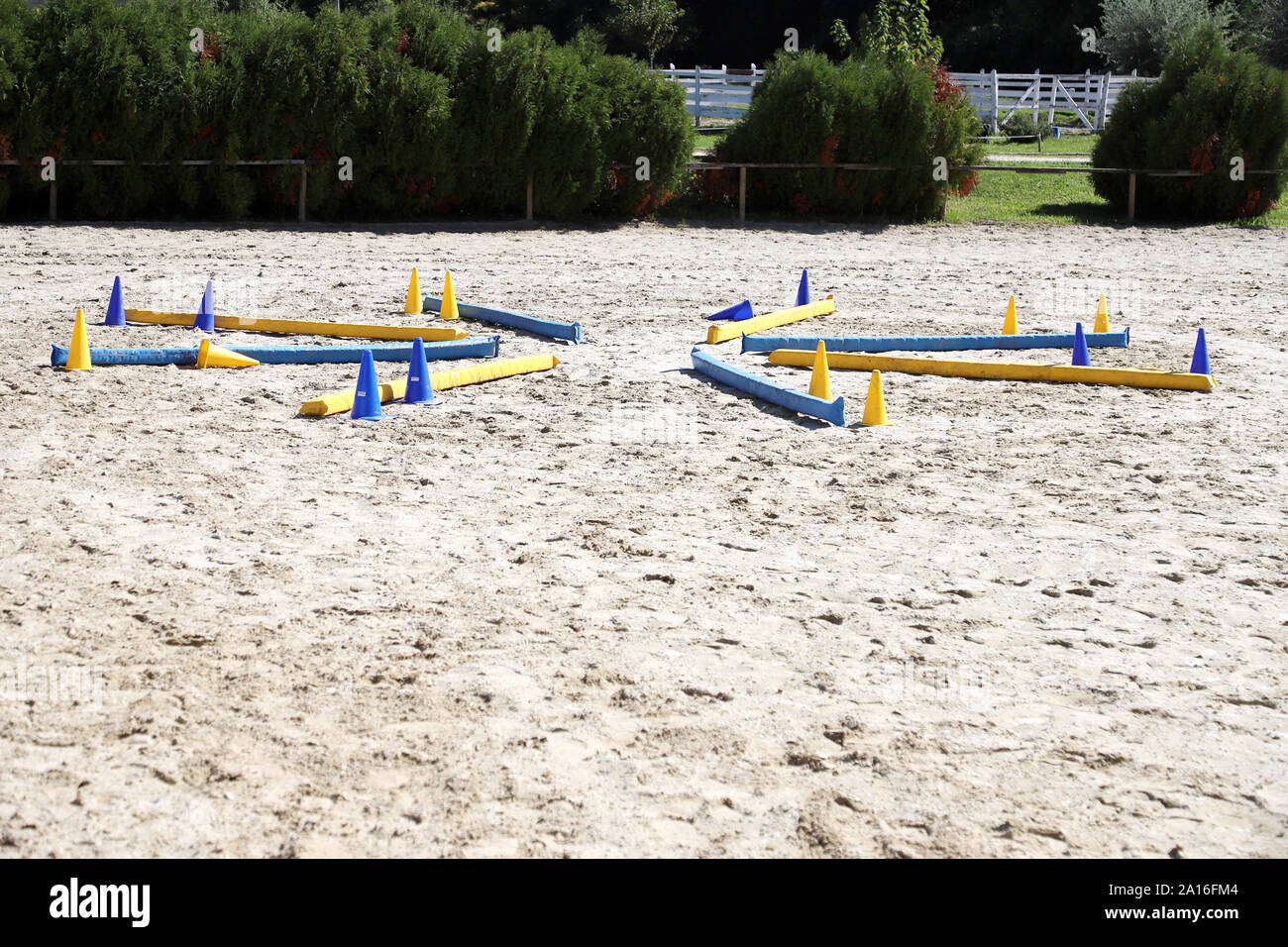 Obstacles for horses in a riding school.Various colorful obstacles for ...