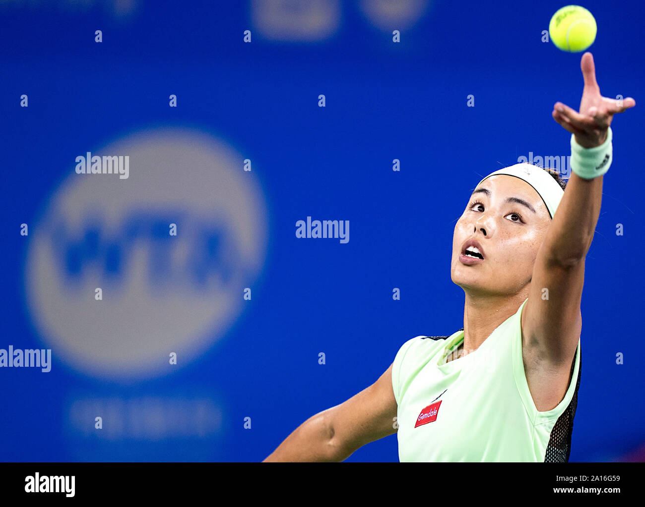 Wuhan. 24th Sep, 2019. Wang Qiang of China serves during the women's ...