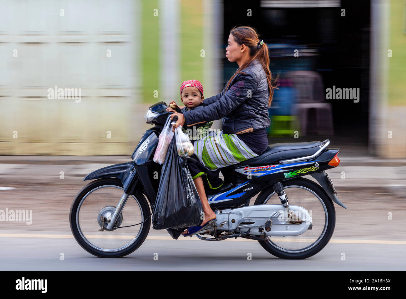 A Mother and Child Riding A Motorcycle, Nyaung Shwe, Lake Inle, Shan ...