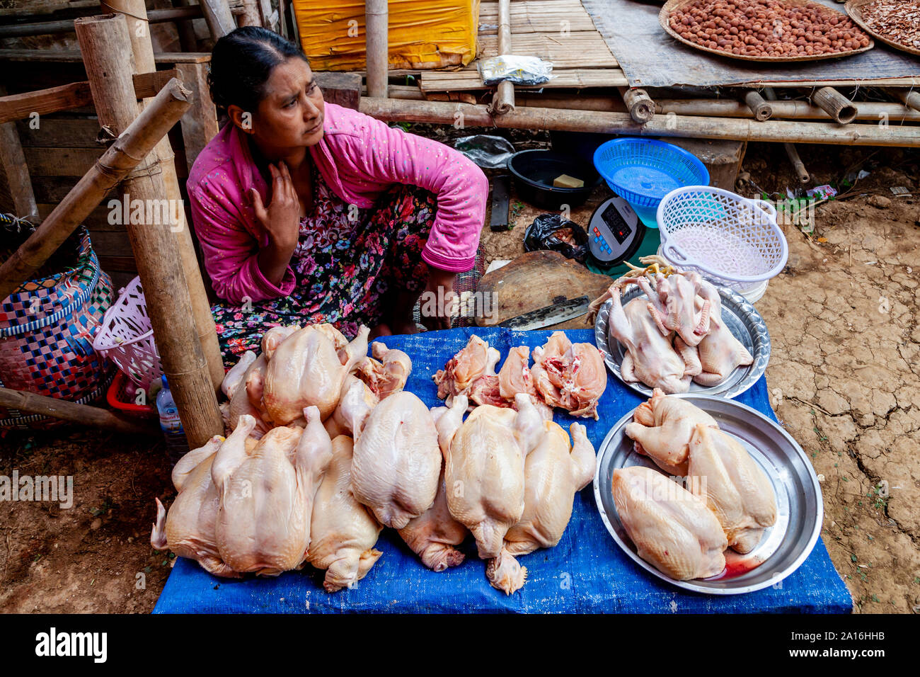 Woman selling poultry hi-res stock photography and images - Alamy