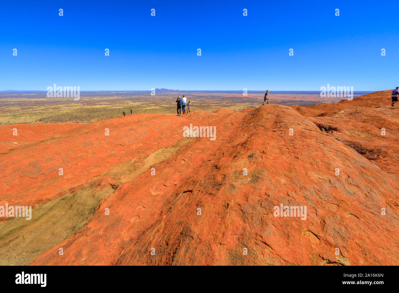 Uluru, Northern Territory, Australia - Aug 23, 2019: people looking ...