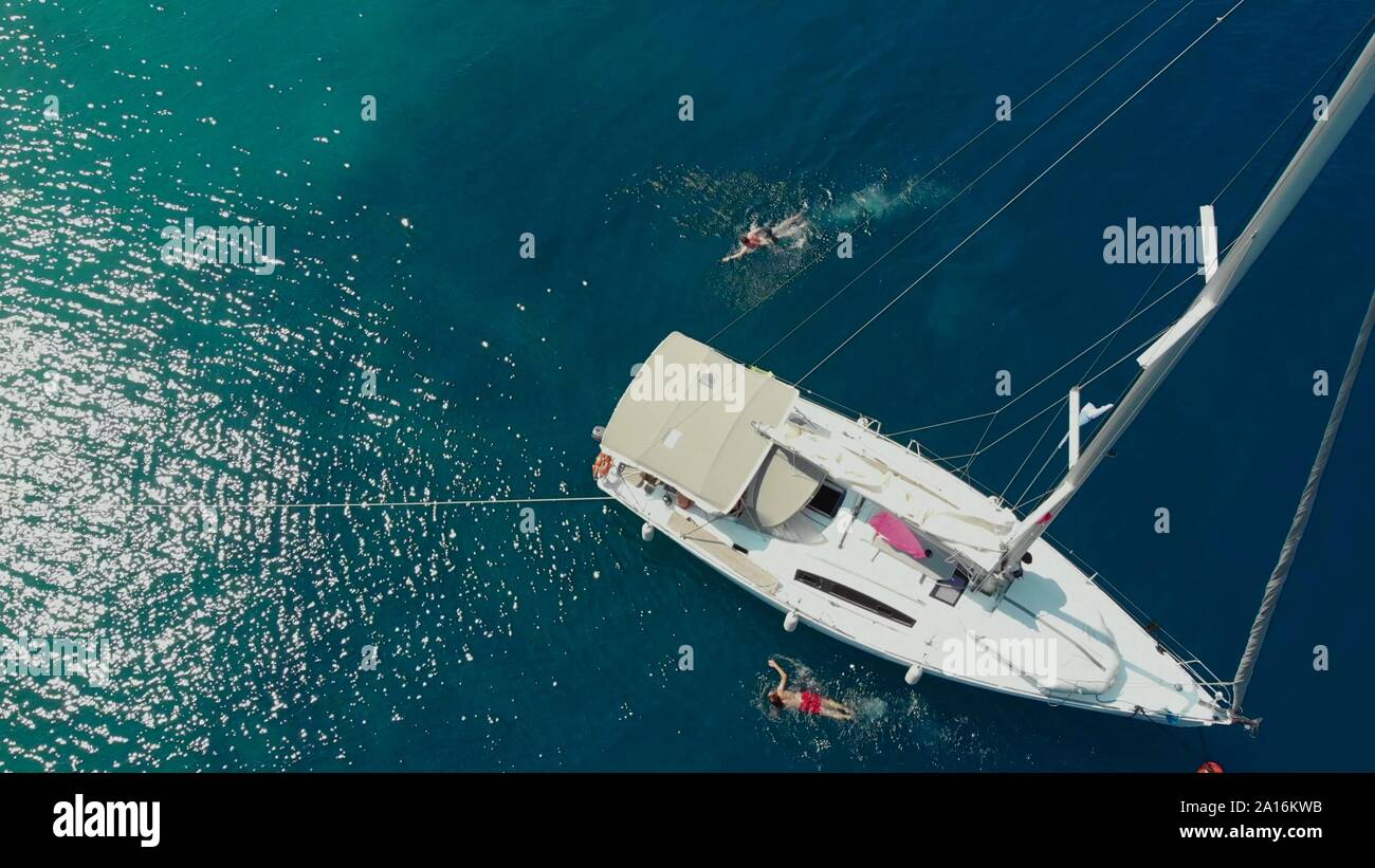 Sailing regatta, boat trip, top view. White yacht in the blue sea ...