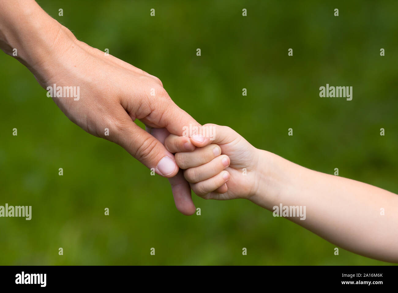 Children holding hand help hi-res stock photography and images - Alamy