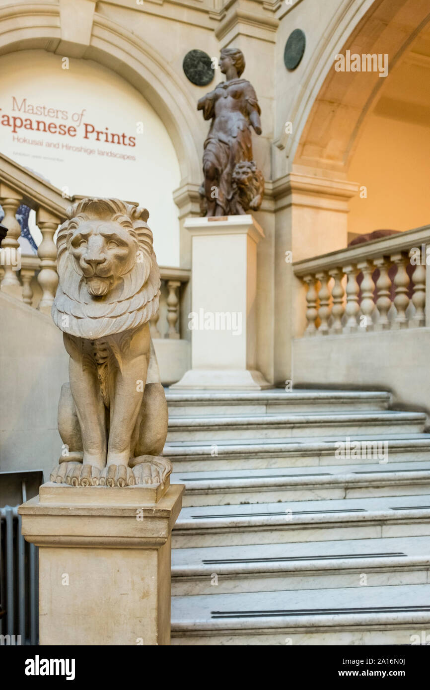 Stone sculpture of Lion at the bottom of staircase, Bristol Museum ...