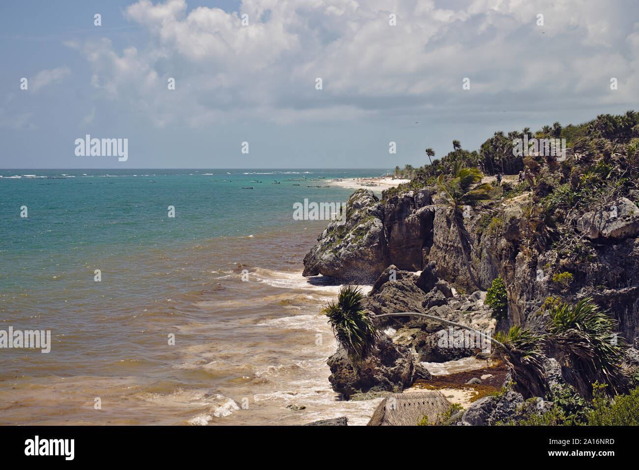 Tulum coastline with turquoise water beach, palm trees and cliffs Stock ...