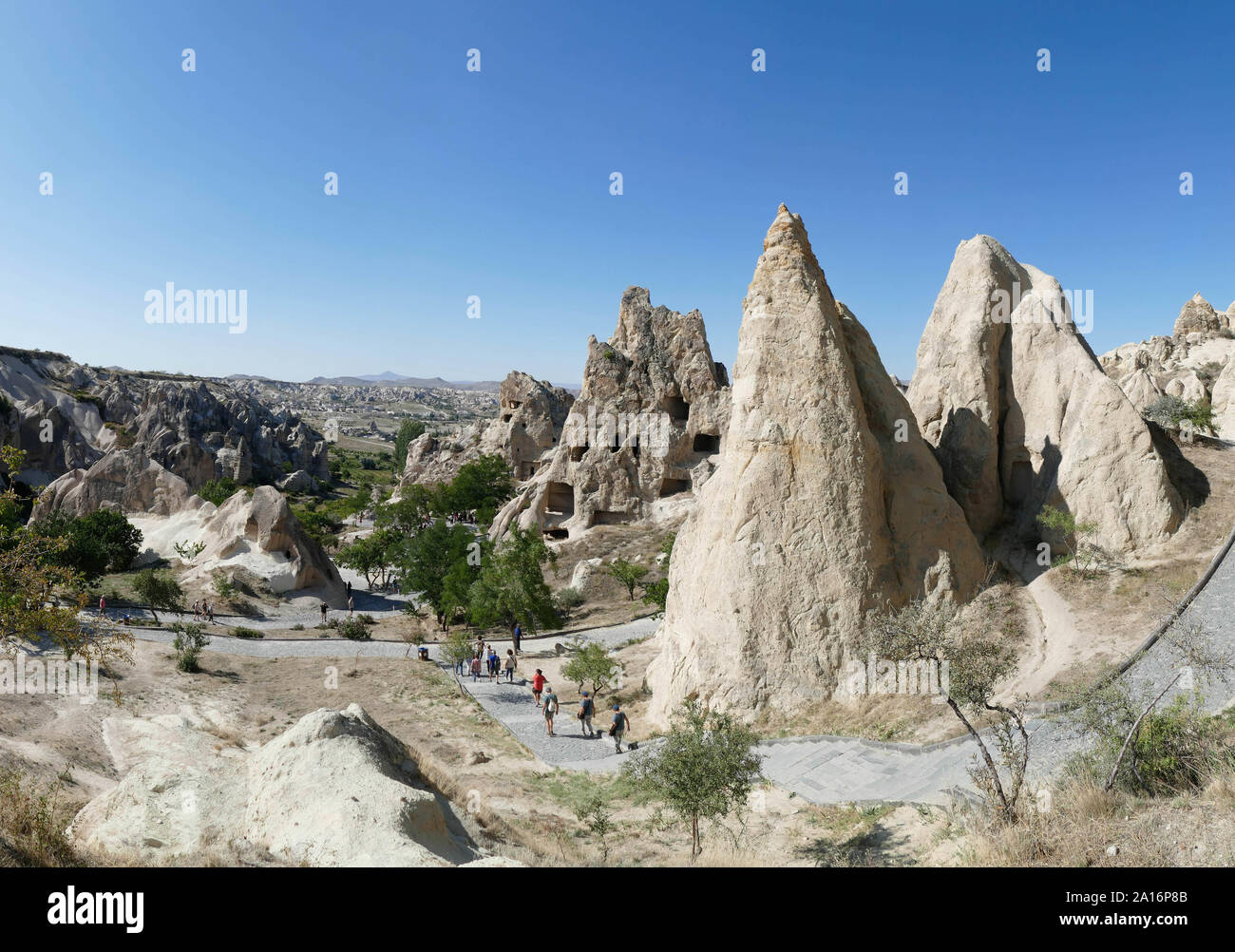 CAPPADOCIA, TURKEY - SEP 11, 2019 - Tourists explore Ancient Christian ...