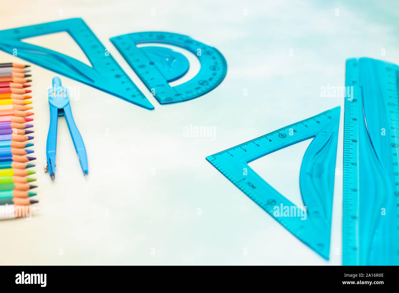 Blue school supplies on the table for boys Stock Photo - Alamy