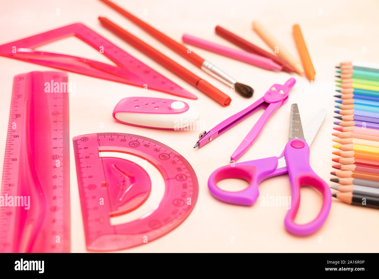 Pink school supplies on the table for girls Stock Photo - Alamy