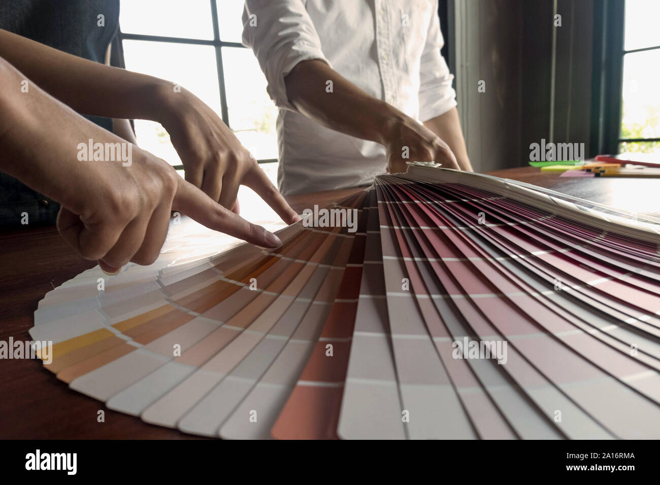 Graphic designers choose colors from the color bands samples for design ...