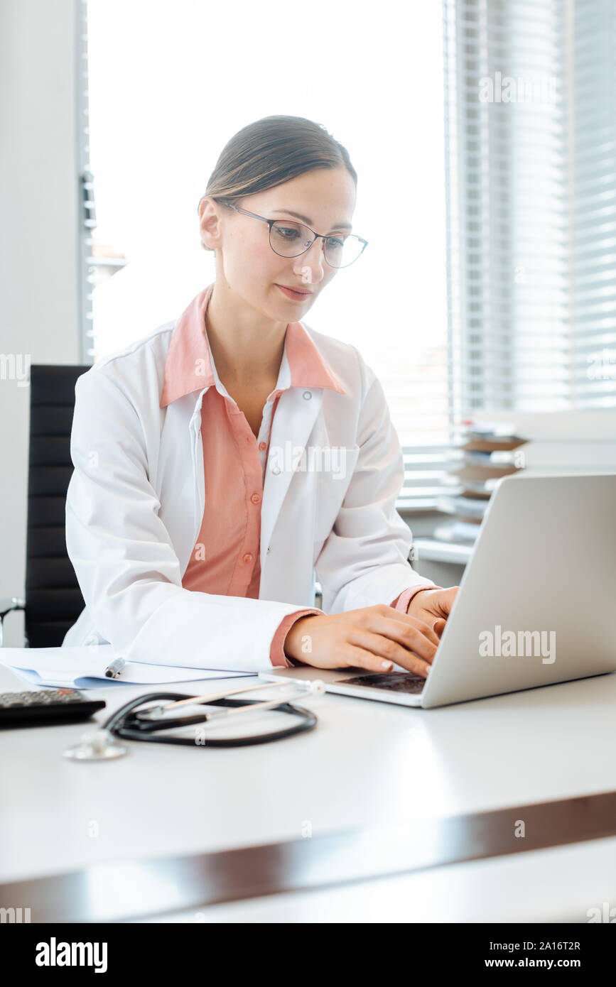 Doctor paperwork gp hi-res stock photography and images - Alamy