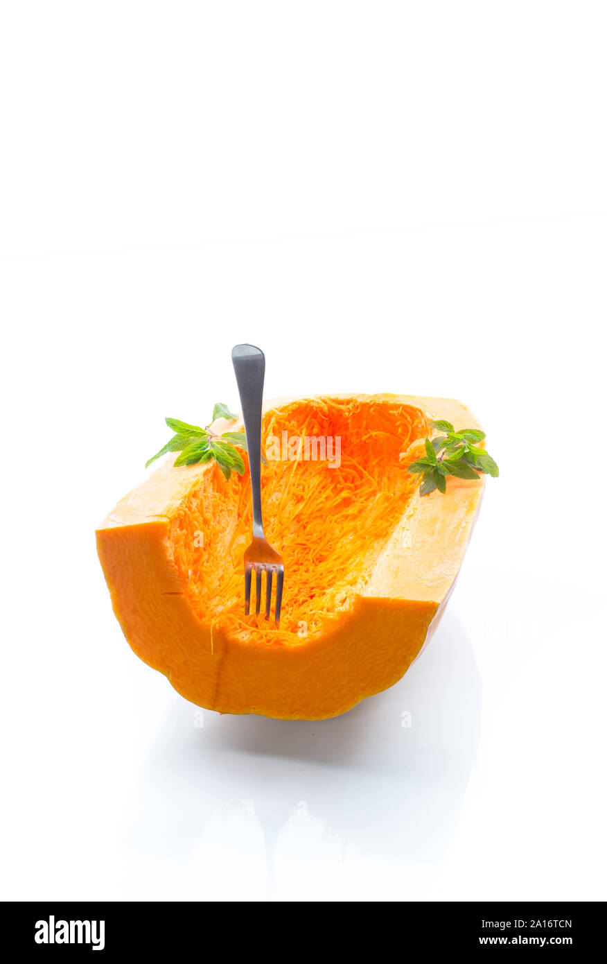 Fresh ripe half cut pumpkin Cut Out Stock Images & Pictures - Alamy