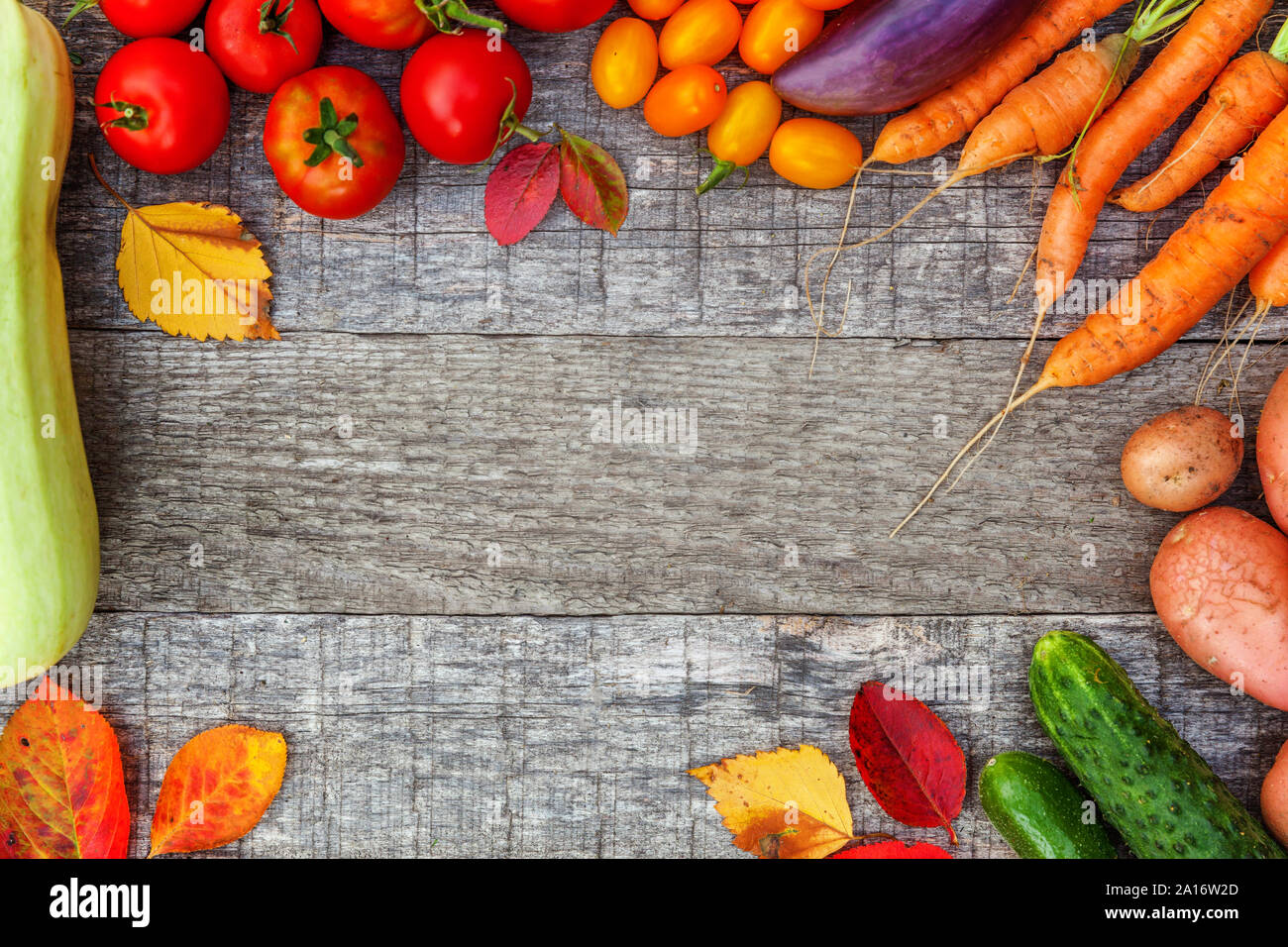 Assortment different fresh organic vegetables on country style wooden ...