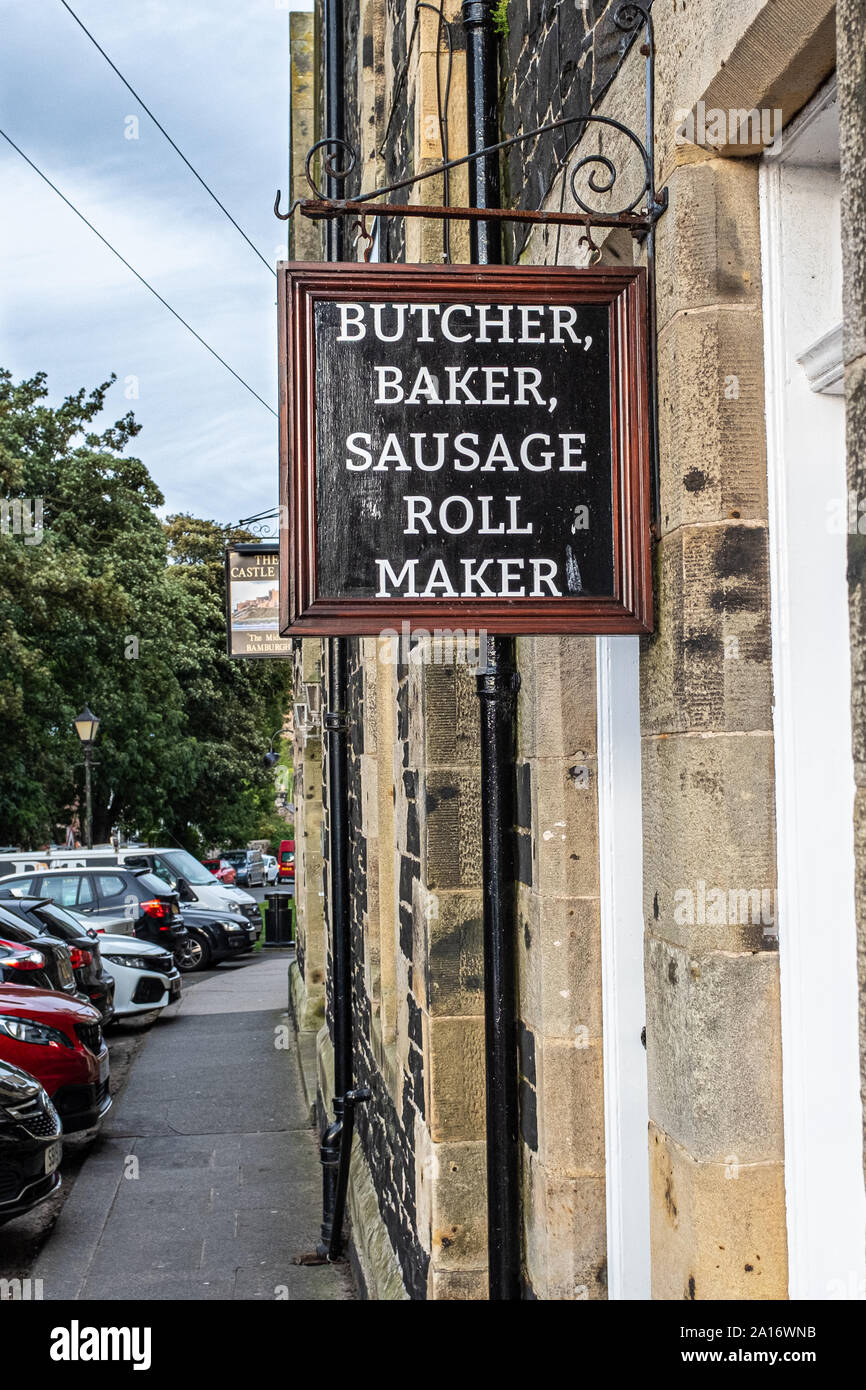 Unusual butcher’s sign in Bamburgh, Northumberland, UK Stock Photo - Alamy