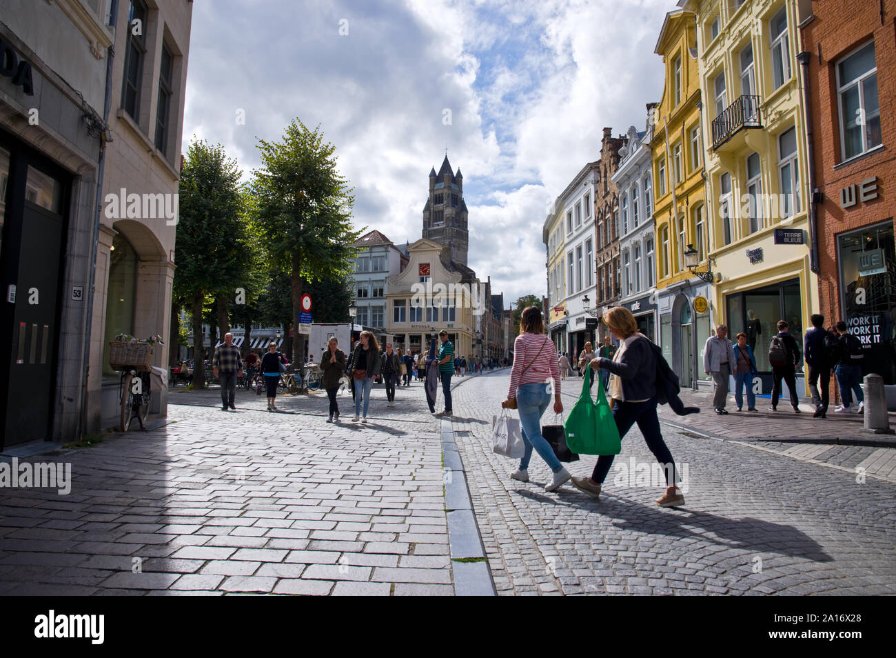 Shoppers and people going about their day in Bruges, Belgium Stock ...