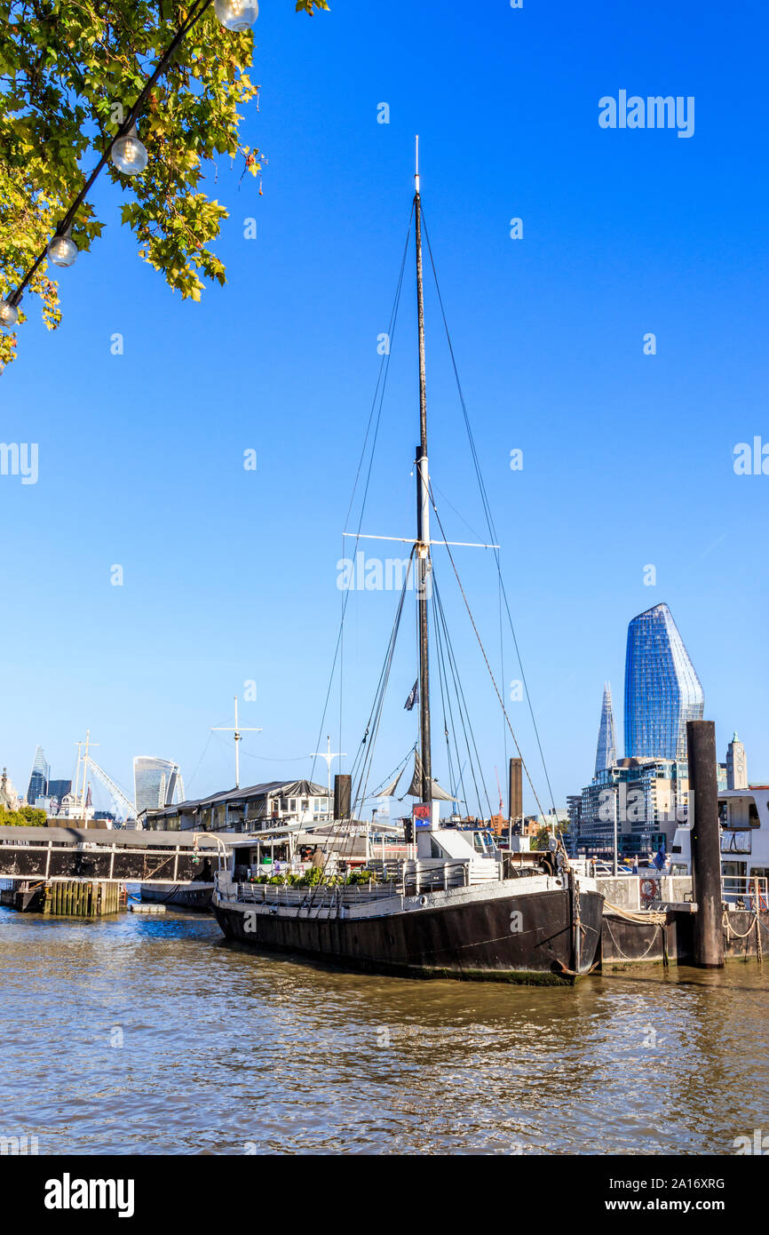The Yacht London, a restored 1920s boat with a restaurant, moored in ...