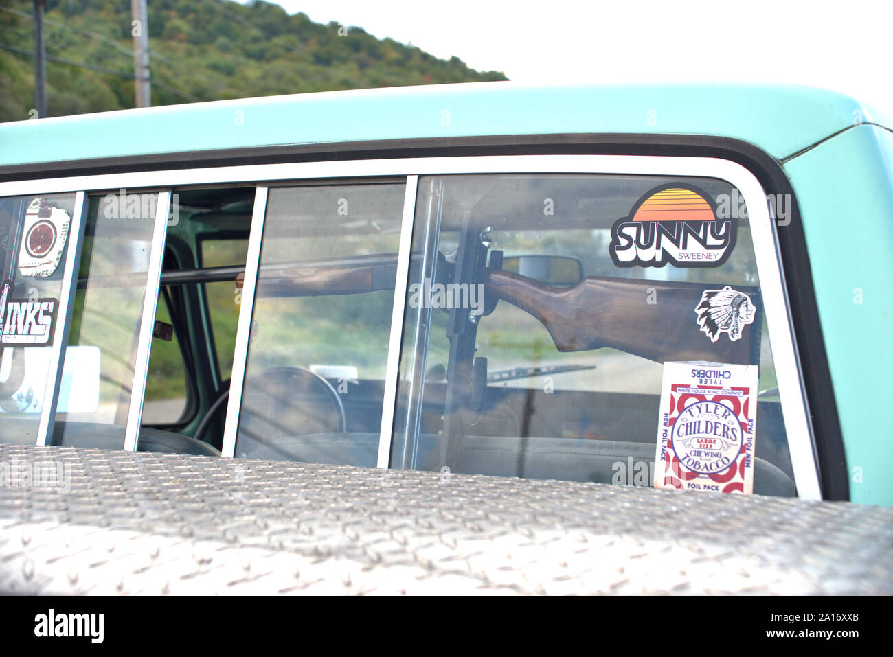 Rifle and rifle rack in the cab of a Ford F-150 pick-up truck, Olean ...