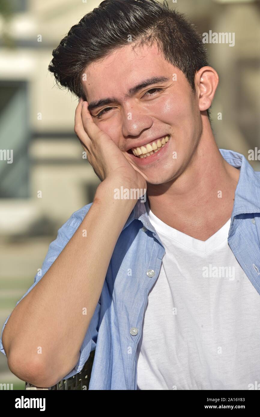 A Smiling Handsome Minority Male Stock Photo - Alamy