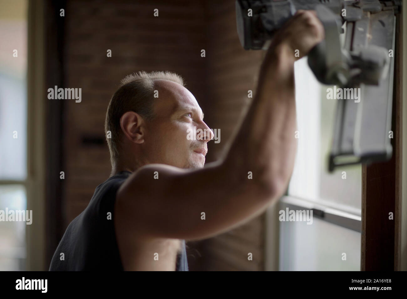 Builder works on constructing hi-res stock photography and images - Alamy