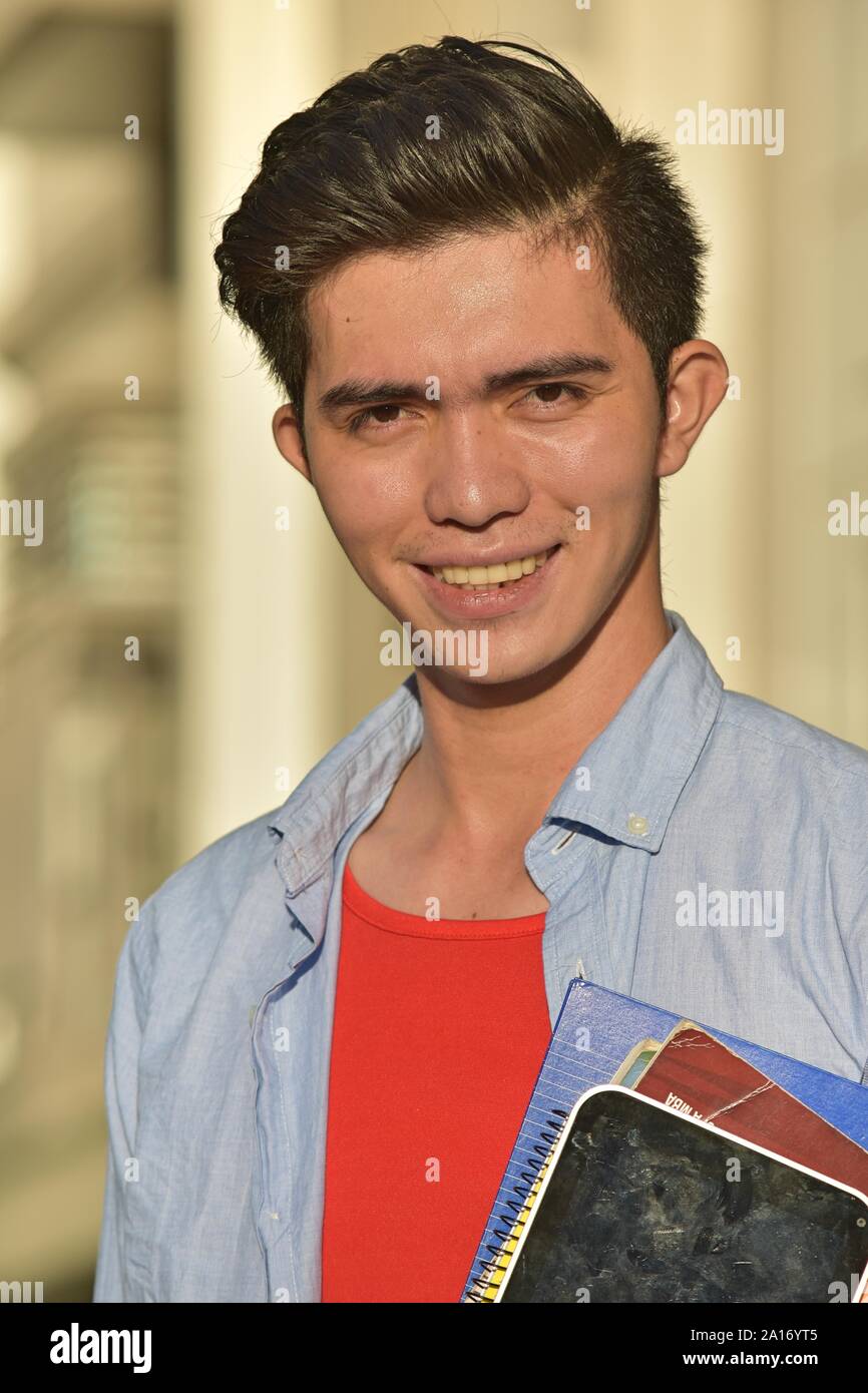A Smiling College Filipino Male Student Stock Photo - Alamy