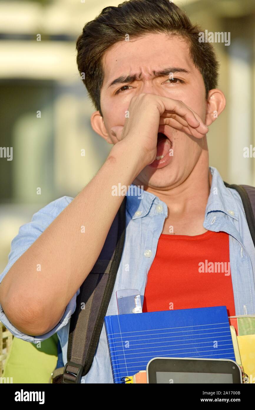 University Filipino Boy Student Talking With Books Stock Photo - Alamy